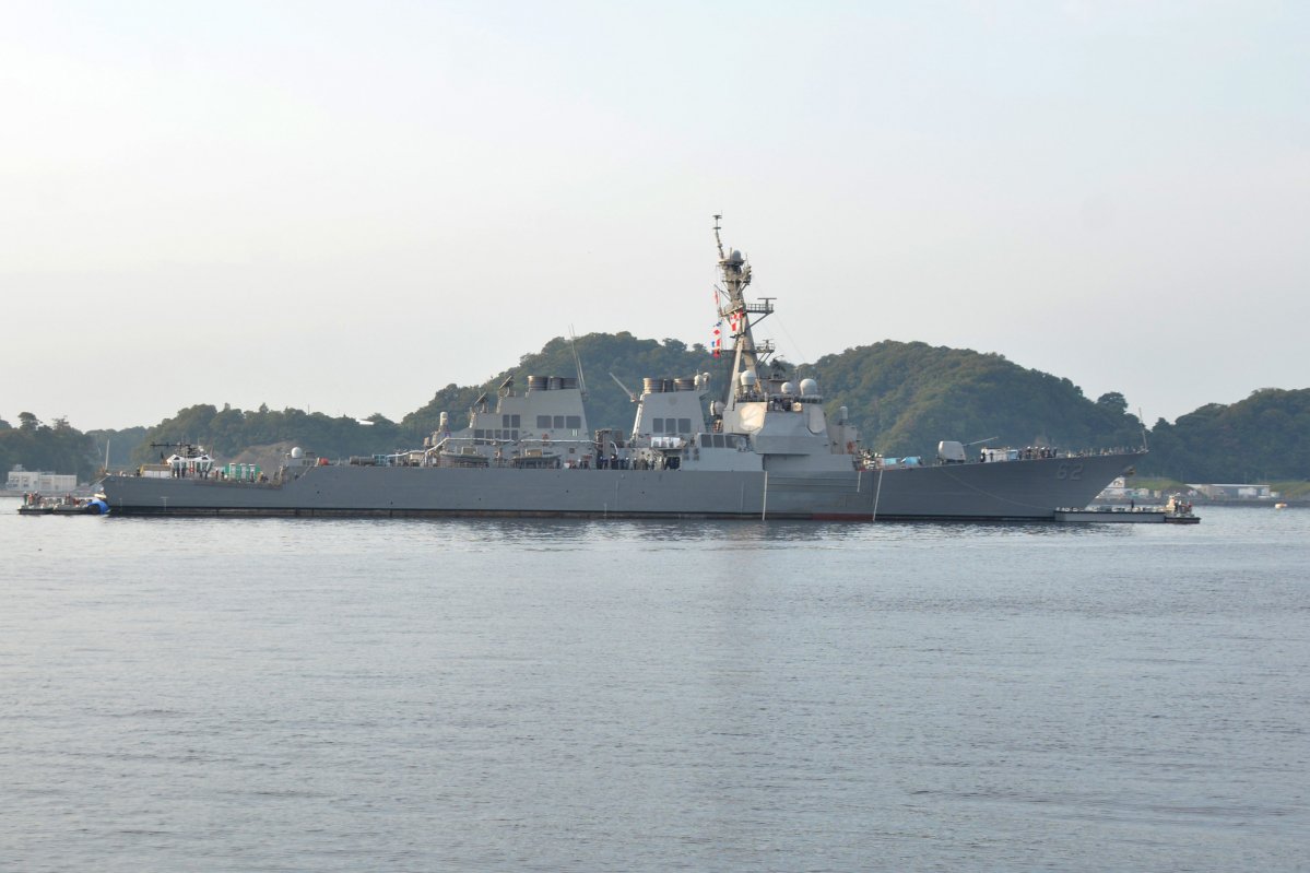 Video: Watch the US destroyer John S. McCain being loaded aboard a he...