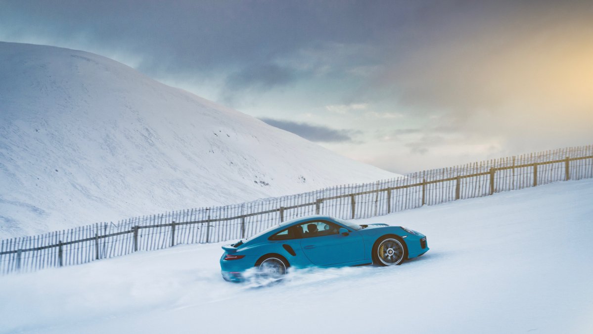 This Porsche 911 Turbo S going up a ski slope is proper motivation