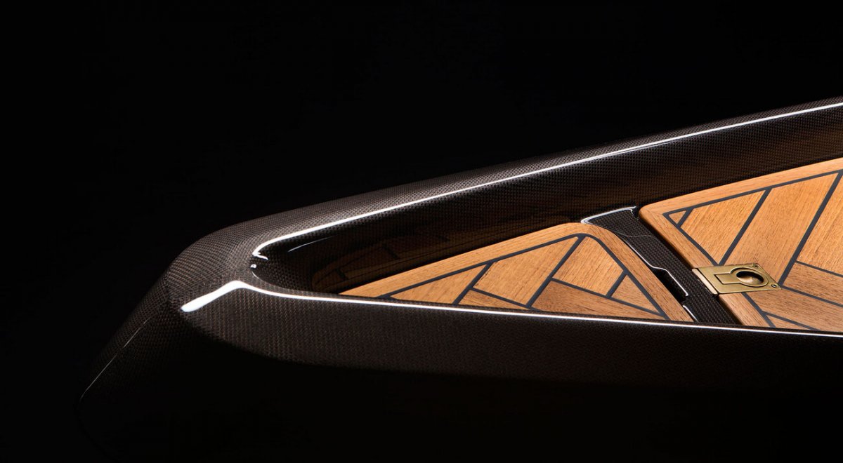 Luxury canoe made from carbon fiber and teak wood